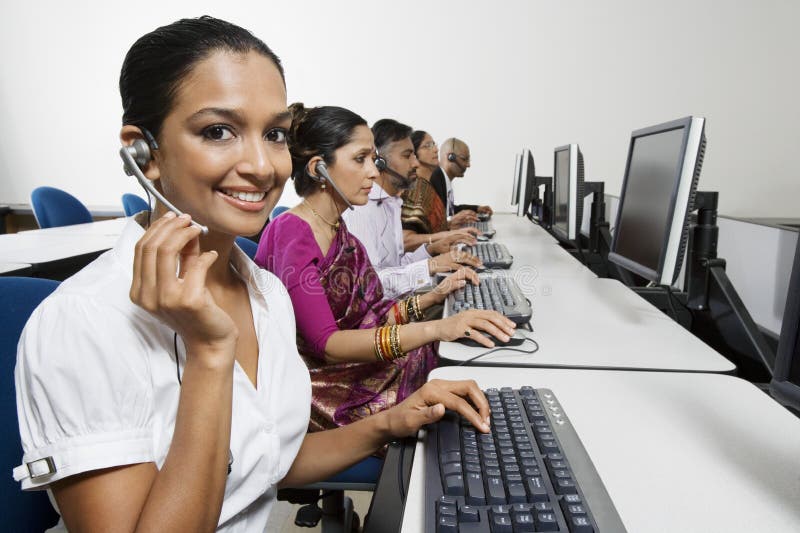 Customer Service Reps in Call Center Stock Photo - Image of headset ...
