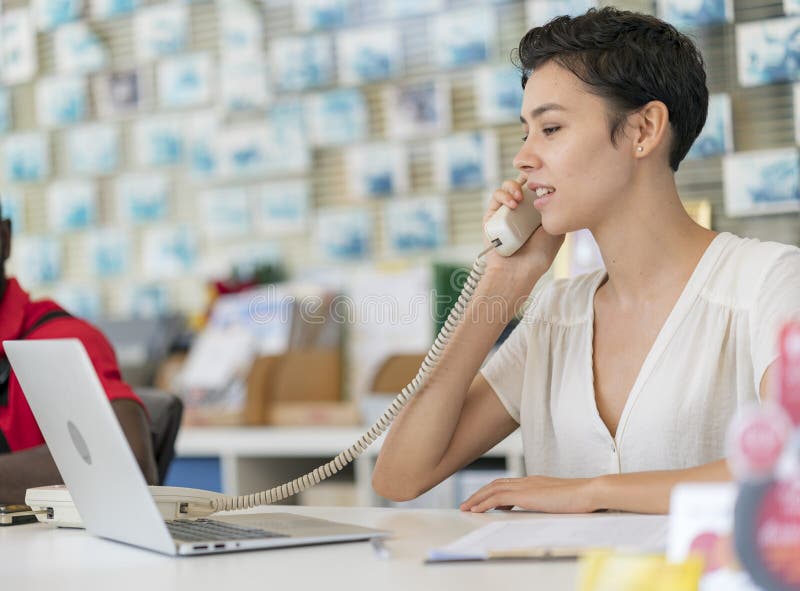 A Female Customer Service Talking on the Phone Stock Image - Image of ...