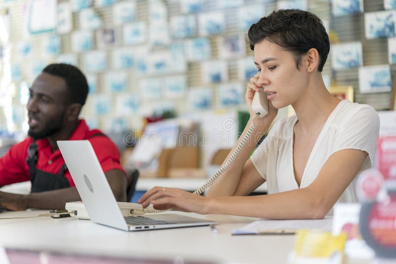 A Female Customer Service Talking on the Phone Stock Image - Image of ...