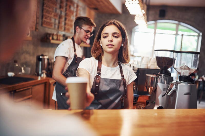 Customer Service. Two Young Cafe Workers Indoors Stock Photo - Image of ...