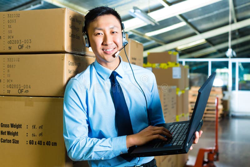 Customer Service in Asian Logistics Warehouse Stock Photo - Image of ...