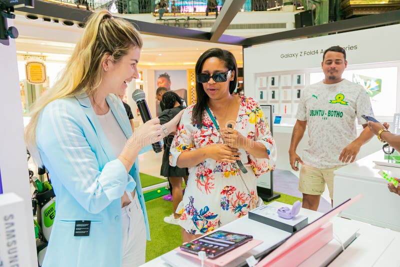 Customer Shopping for Mobile Phone in Retail Store. Editorial Stock ...