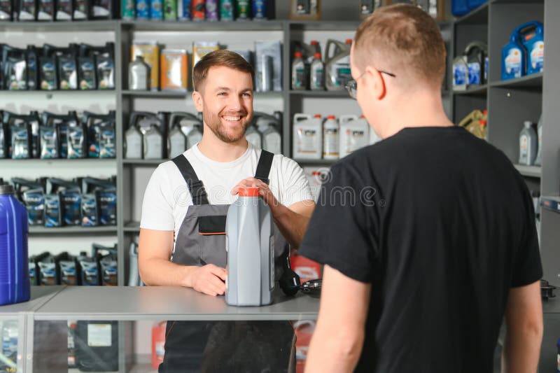 A Customer Speaks with a Consultant at an Auto Parts Store Stock Image ...