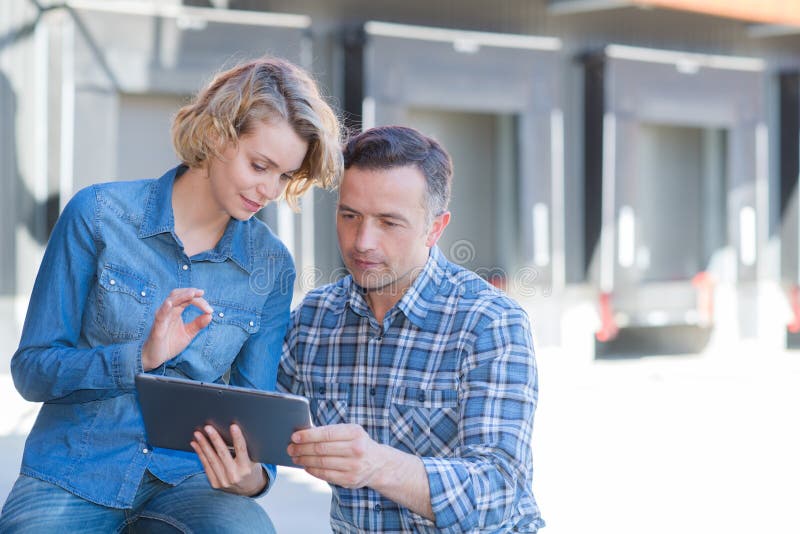 Customer Standing with Construction Worker Outside Stock Photo - Image ...