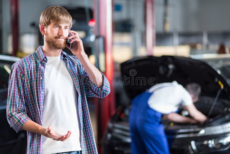 Customer Standing in Garage Stock Image - Image of automobile ...