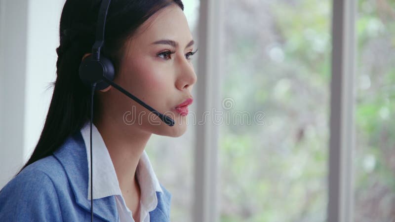 Customer Support Agent or Call Center with Headset Talking To Customer ...