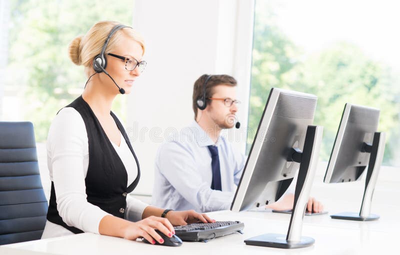 Customer Support Operators in Formalwear Working Using Computers Stock ...