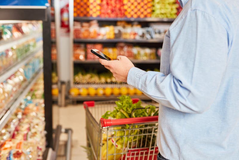 Customer Uses Smartphone with Barcode Scanner Stock Image - Image of ...
