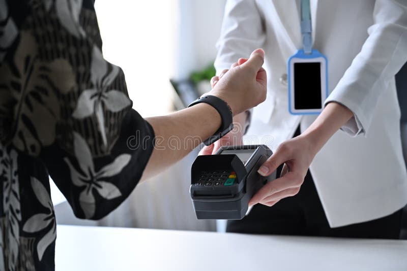 Customer Using Smart Watch for Payment at Restaurant. Stock Image ...