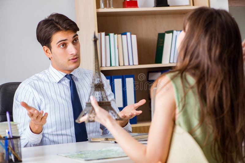 The Customer Visiting Travel Agency and Talking To Agent Stock Image ...