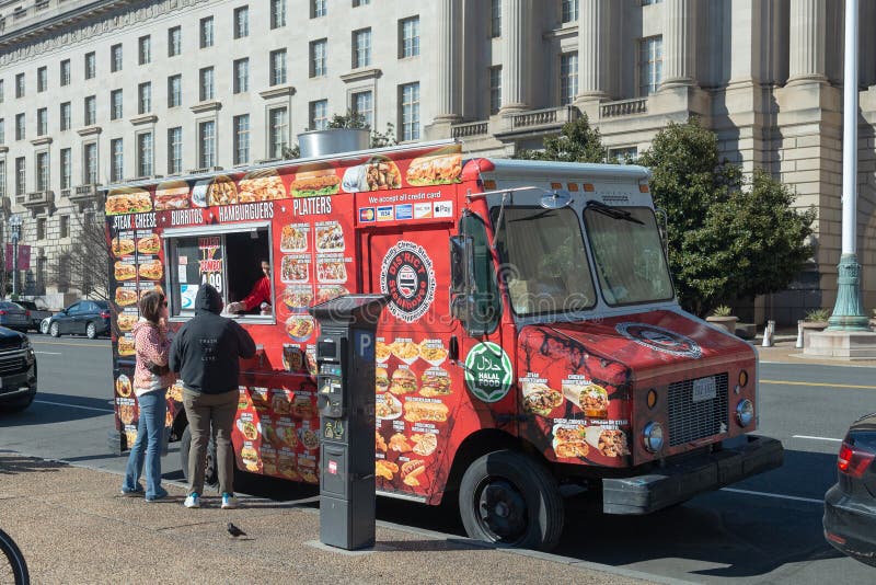 Customers Buy Food from the Owner in a Van in Front of a Building in ...