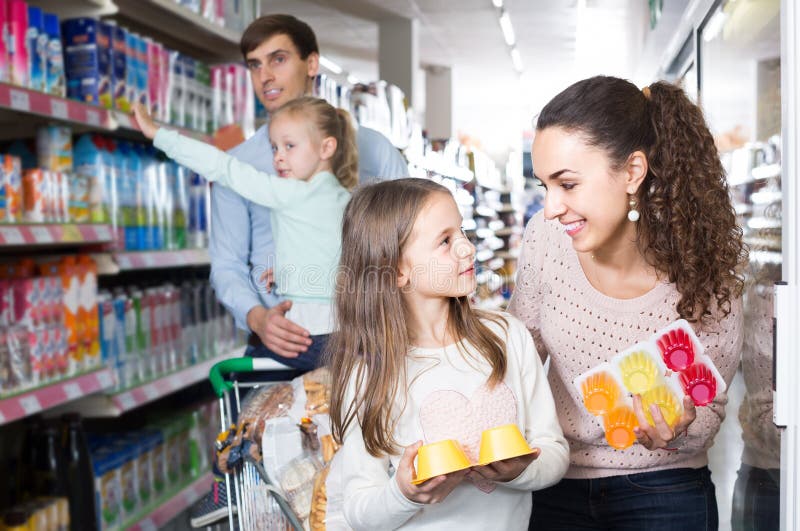 Customers with Children Selecting Sweet Dairy Products in Hyper Stock ...