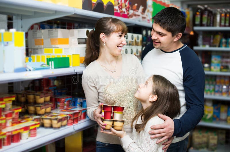 Customers Choosing Dairy Products and Smiling in Hypermarket Stock ...