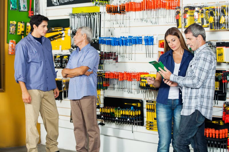 Customers Standing in Line at Checkout Counter in Stock Photo - Image ...