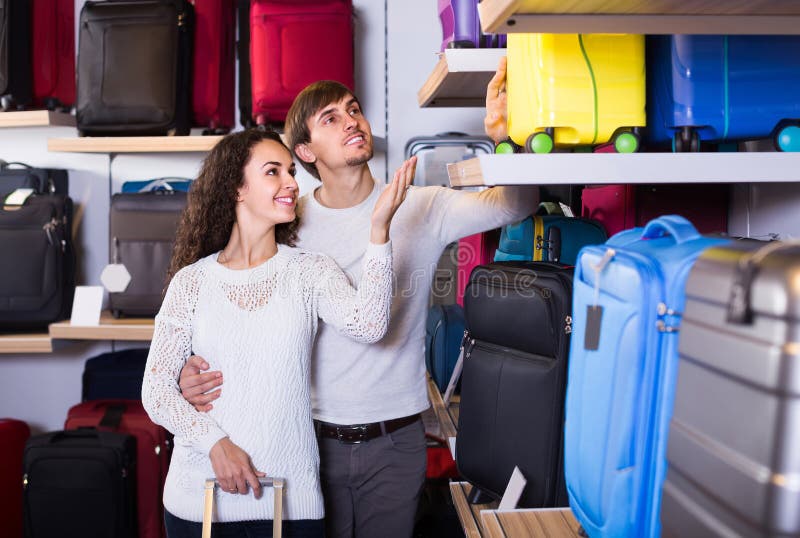 Customers Looking at Roll-aboard Bags in Store Stock Image - Image of ...