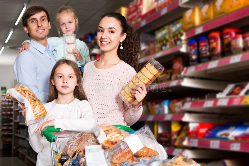 Customers with Small Children Purchasing Shortcakes Stock Image - Image ...