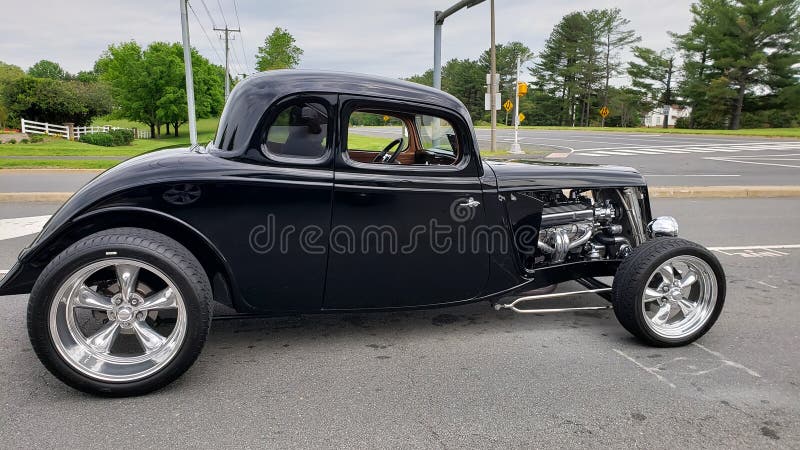 Customized Classic Lowrider Hot Rod Roadster with Exposed Engine, Big ...