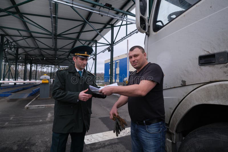 The Customs Post Inspector Checks the Customs Declaration with the ...