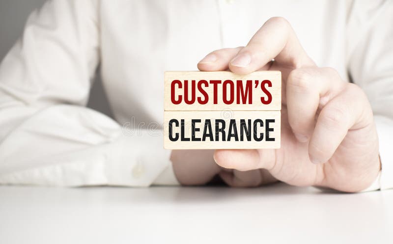 Word CUSTOMS CLEARANCE on Notebook with Pencil on the Grey Background ...