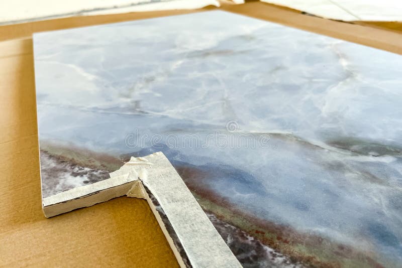 Cut of Big Tile on New Stone Floor. Stock Image - Image of work, tool ...