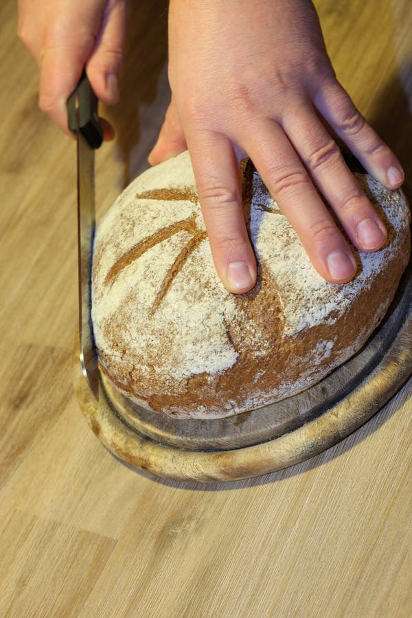 Cut a bread stock image. Image of table, board, cuts - 17992857