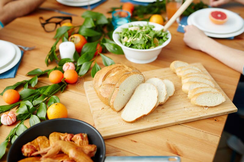 Cut bread served on table stock photo. Image of green - 118347764
