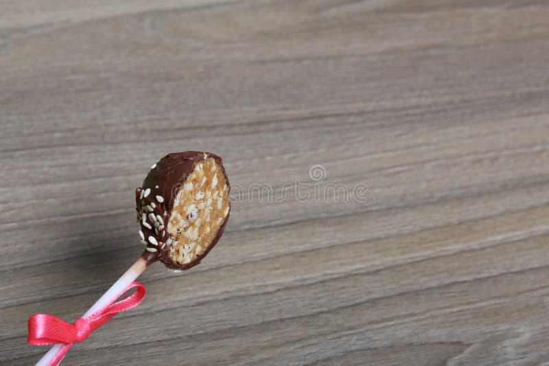 Cut Cake Pops. on a Background with a Woody Texture Stock Image - Image ...