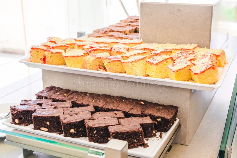 Cut cakes on the plate stock photo. Image of fudge, cake - 156638132