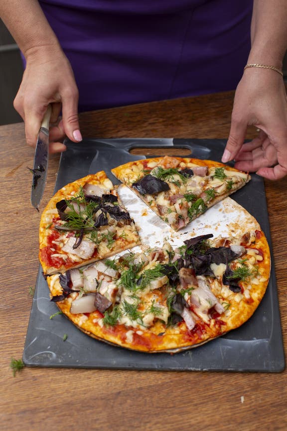 Cut the cheap pizza stock image. Image of vegetable - 335412301