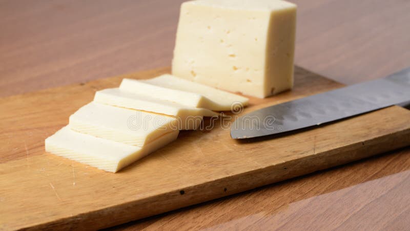 Cut Cheese on a Wooden Board Stock Image - Image of delicatessen ...