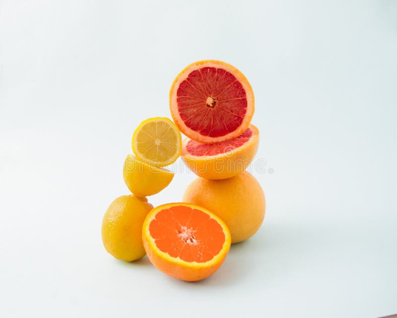 Cut Citrus Mix Fruit on the White Background. Summer Fresh Food Concept ...