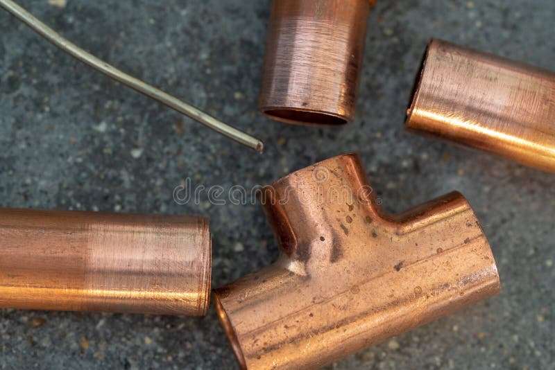 Copper Fittings with a Strand of Sodder Stock Photo - Image of fittings ...