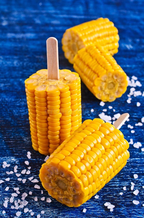 Cut Corn on the Cob on a Stick Stock Photo - Image of boiled, autumn ...