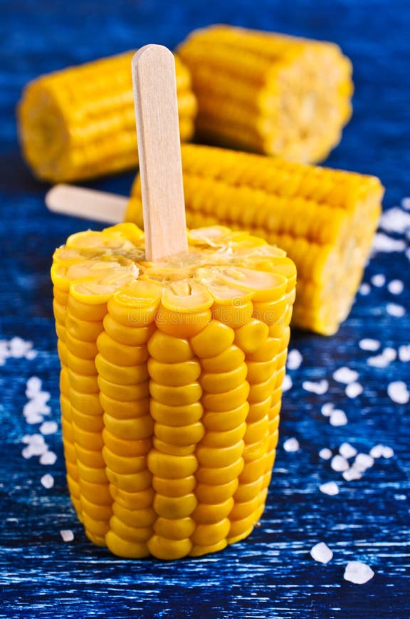 Cut Corn on the Cob on a Stick Stock Photo - Image of organic, boiled ...