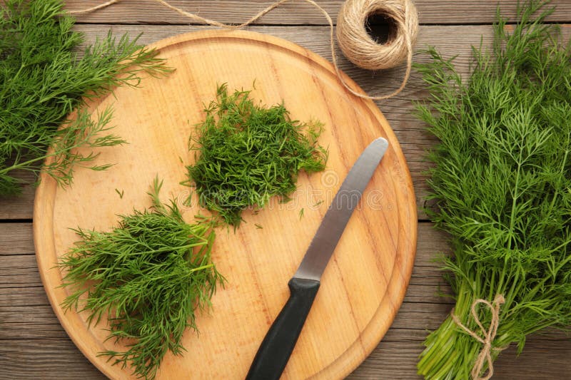 Cut Dill on Cutting Board on Grey Background Stock Photo - Image of ...