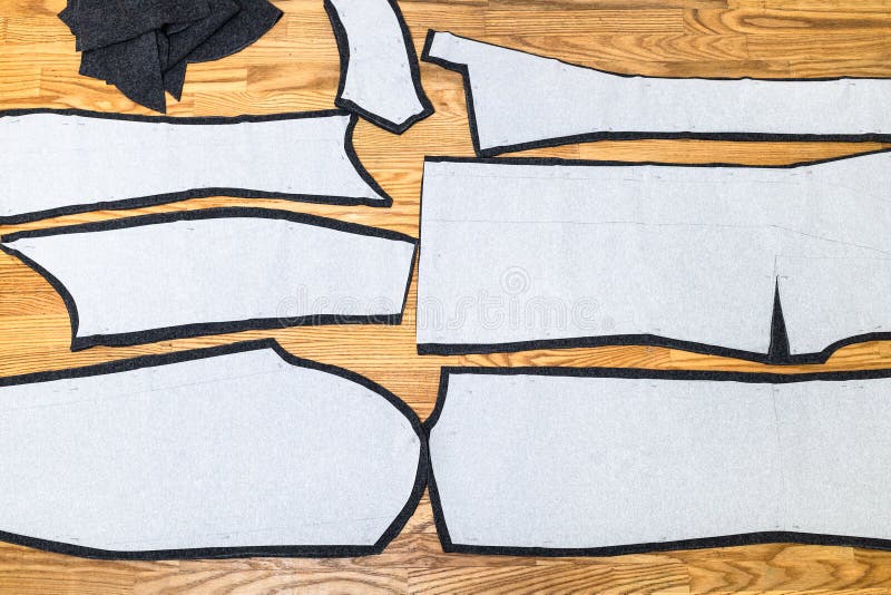 Cut Dress Details with Sewing Patterns on Table Stock Image - Image of ...