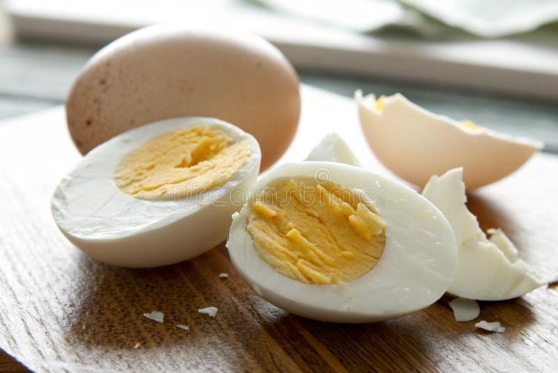 Cut Egg on the Table stock illustration. Illustration of homemade ...