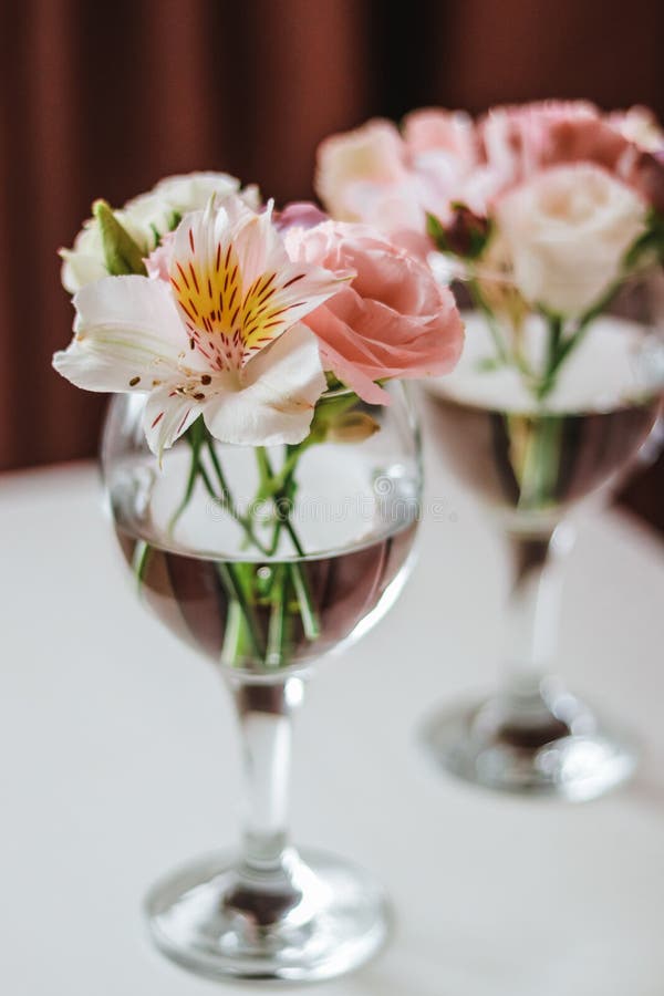 Cut Flowers in Glasses of Water. Mini Composition for Table Decoration ...