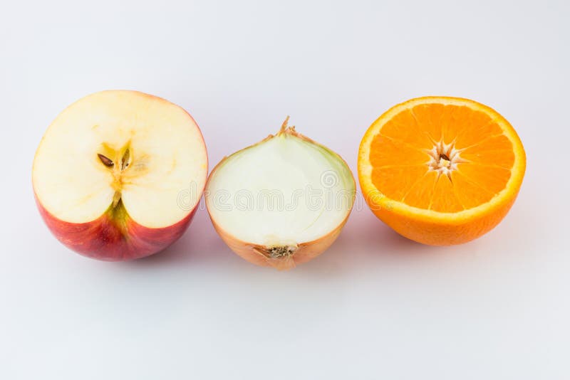 Cut Fresh of Apple, Orange and Onion. Stock Photo - Image of orange ...