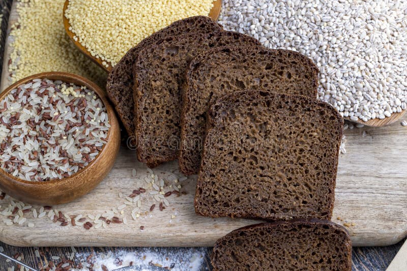 Cut Fresh Bread into Pieces while Cooking with Bread Stock Photo ...
