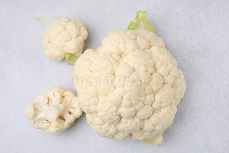 Cut Fresh Raw Cauliflower on Light Grey Table, Flat Lay Stock Image ...