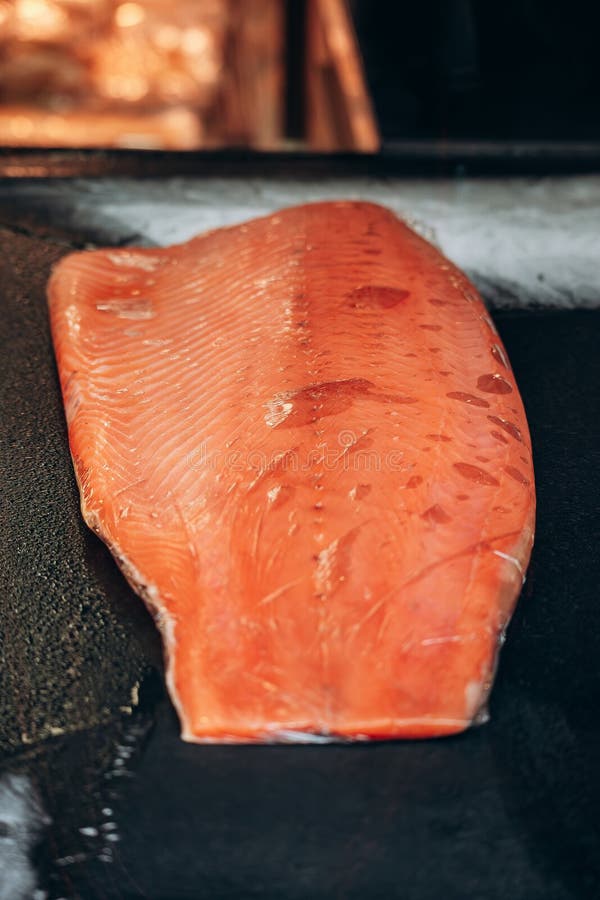 Cut Fresh Salmon in a Fishmonger S Display Case Stock Photo - Image of ...