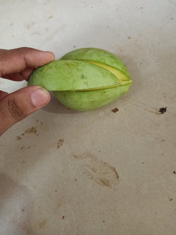 Cut of green mango stock photo. Image of food, plant - 179842060
