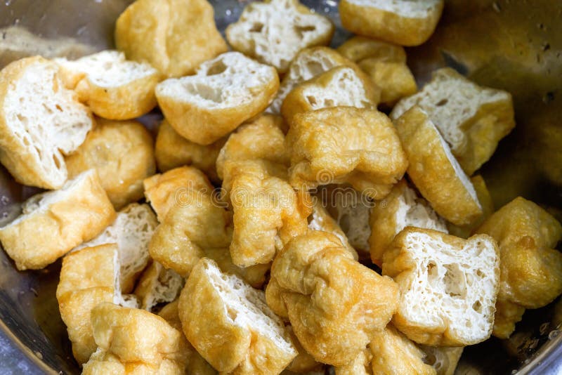 Cut Half of Fried Tofu Close-up in the Kitchen Stock Photo - Image of ...