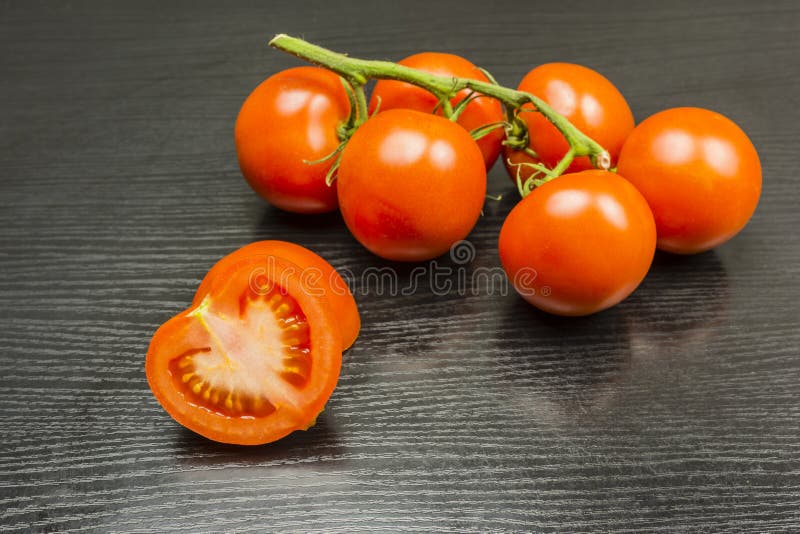Cut in Half a Red Ripe Tomato on the Table. Stock Image - Image of ripe ...
