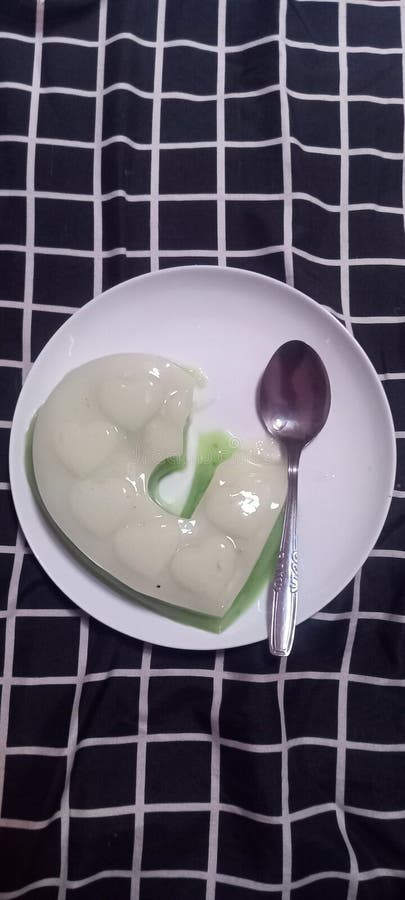Cut Heart Shaped Pudding, Using a Spoon Stock Photo - Image of shaped ...