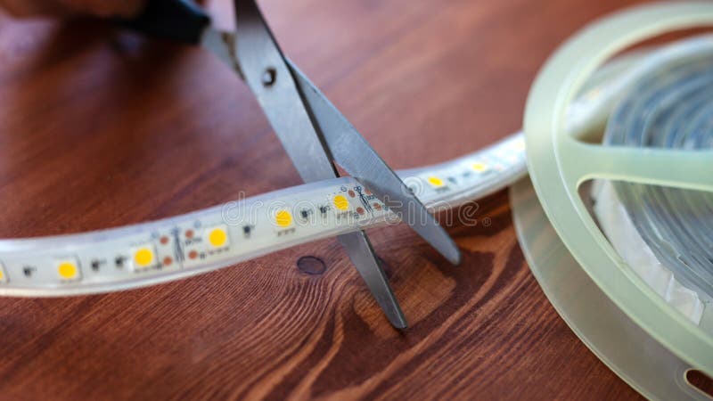 Cut the LED Strip with Scissors Closeup Stock Photo - Image of white ...