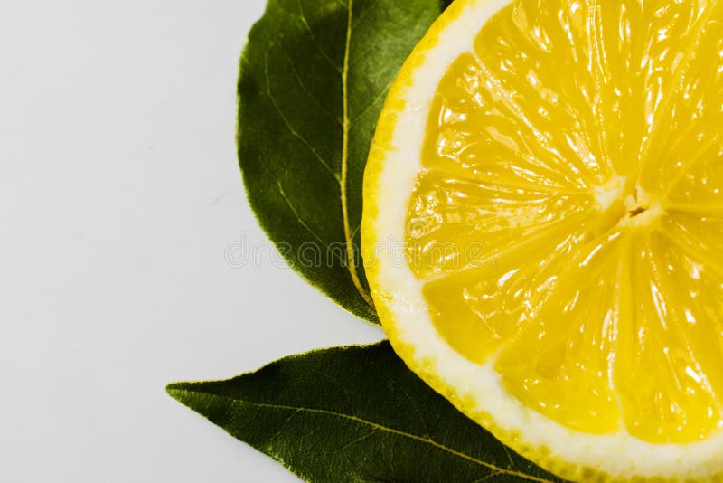 Cut Lemon with Green Leaves Stock Image - Image of background, white ...