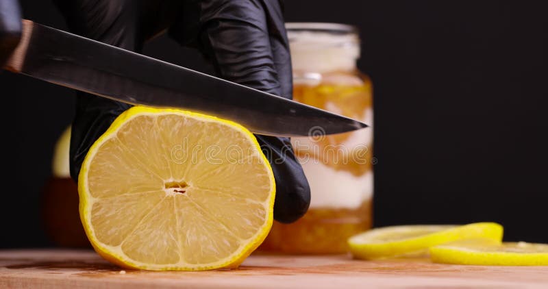 Cut the Lemon into Pieces on the Table Stock Footage - Video of ...