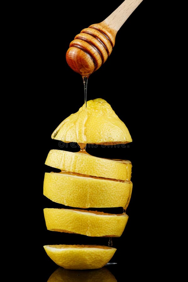 A Cut Lemon is Poured with Honey. Lemon with Honey Stock Image - Image ...